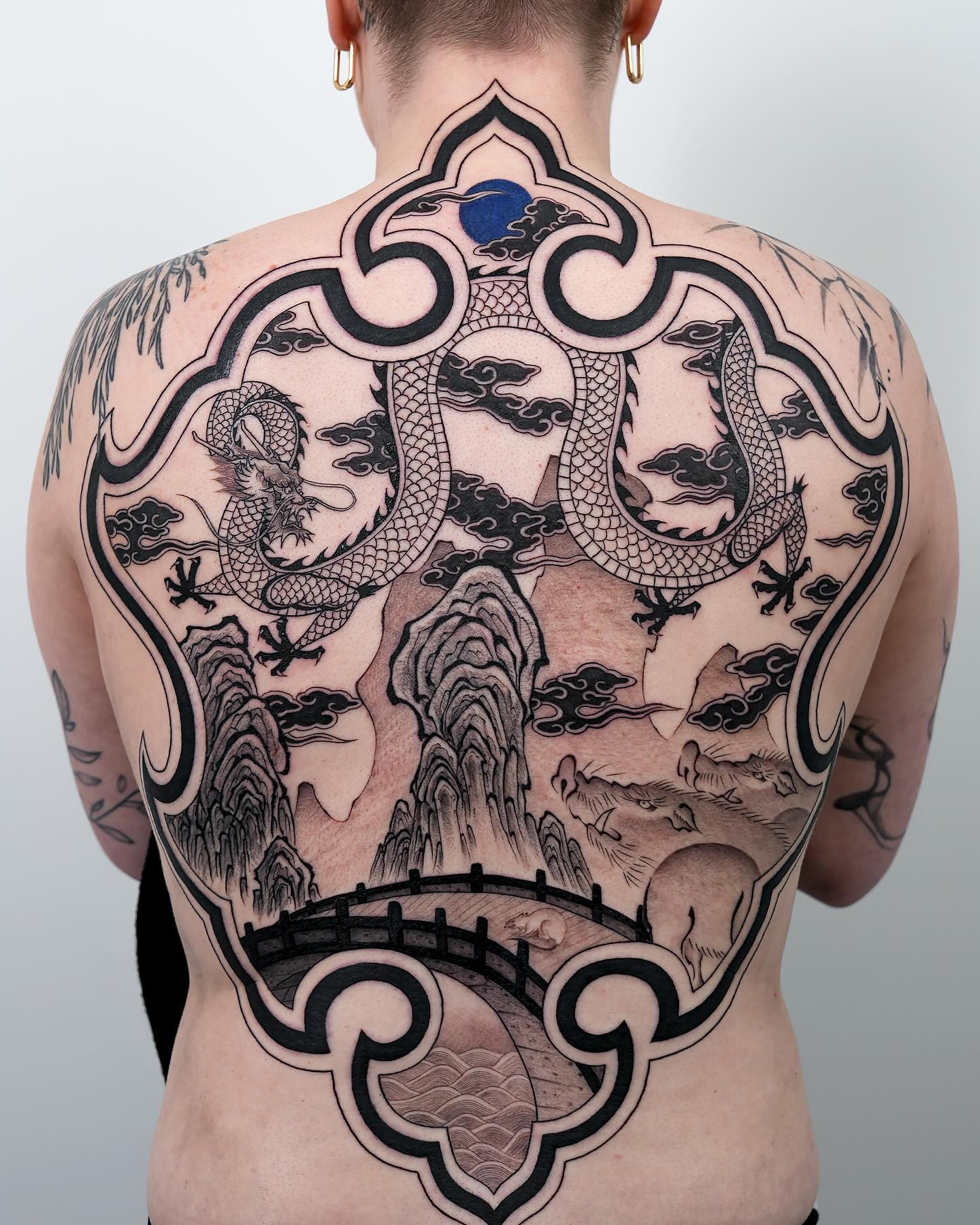 The Ultimate Guide to Back Tattoos: Designs, Care, and Choosing the ...